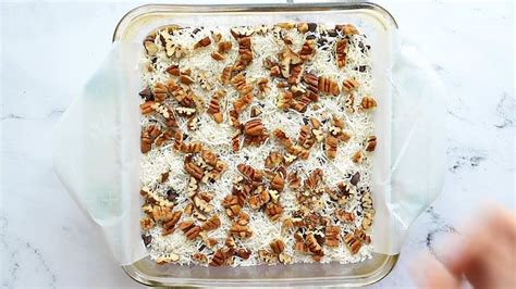 Magic Cookie Bars Adding Toppings Magic Cookie Bars Cookie Bars Best Bread Recipe