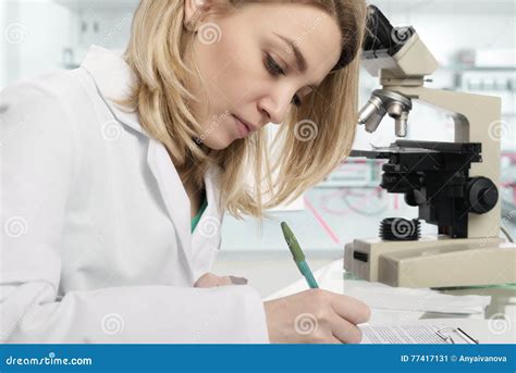 Young Female Scientist Writing In Modern Laboratory Stock Image Image Of Portrait Progress