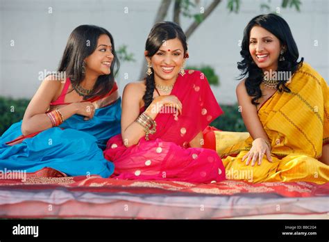 Three Women In Saris Stock Photo Alamy