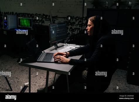 Side View Of Dangerous Hacker Man In Sweatshirt Hacking Online Web Site