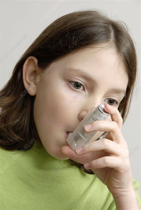 Girl Using An Inhaler Stock Image M109 0394 Science Photo Library