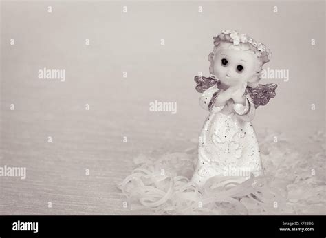 Innocent Angel With Playing Gesture Stock Photo Alamy