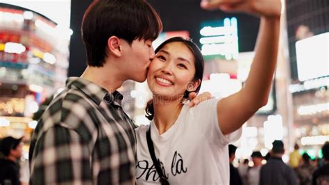 City Night And Selfie With Couple On Street Together In Japan For