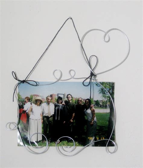 Hanging Swirl Picture Frame With Abstract Heart X Photo