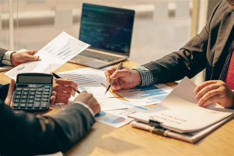 Business Team Analyzing Data Using Computer While Spending Time In Office Financial Planning