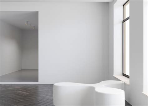 현대 미술 갤러리의 빈 흰색 벽 미니멀리즘 스타일의 내부 조롱 아트웍 그림 텍스트 또는 다른 디자인을 위한 무료 복사 공간 빈 전시 공간 3d 렌더링 프리미엄 사진