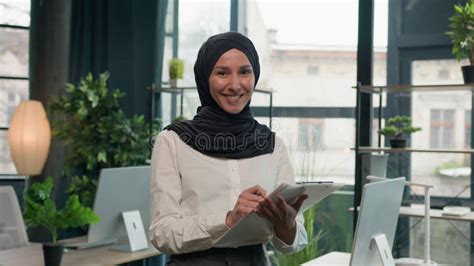 Happy Muslim Islam Woman Arabian Girl In Hijab Hr Manager Secretary With Paper Tablet Write
