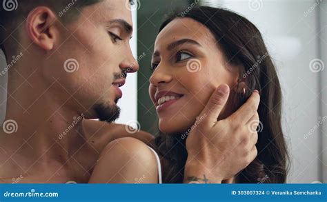 Man Stroking Wife At Bedroom Close Up Married Couple Kissing At Home