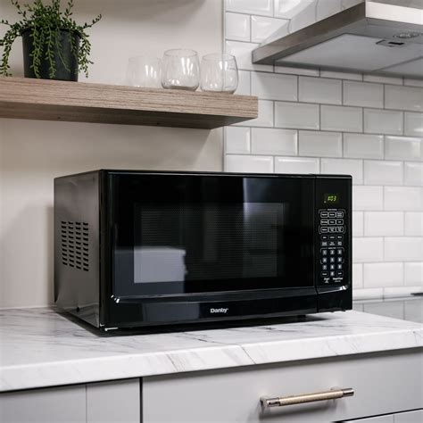 Danby Designer 14 Cu Ft Sensor Cooking Microwave In Black