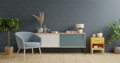 현대 거실의 캐비닛 텅 빈 어두운 벽 배경에 안락의자가 있는 밝은 거실의 내부3d 렌더링 사진 Unsplash의 실내 이미지