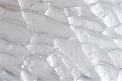 Premium Photo Glimmering Reflections A Captivating Polycarbonate Background Texture