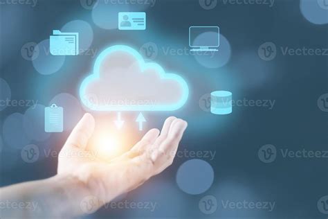 cloud computing concept man s hand holding a virtual image cloud storage which is a form of