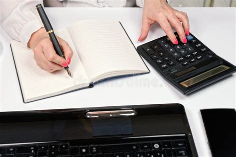 Close Up Of Female Hands With Calculator Fountain Pen And Notebook Stock Photo Image Of