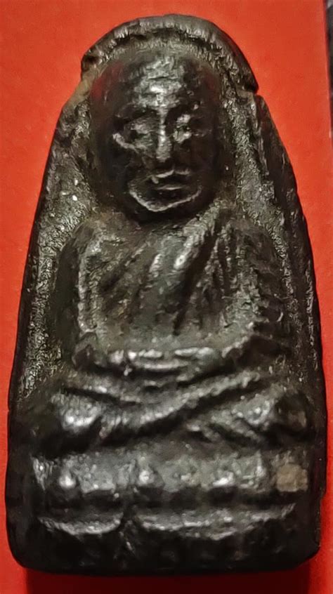 หลวงปู่ทวด พ่อทาบวัดกระบกขึ้นผึ้ง หลังยันต์อุ Ennxo