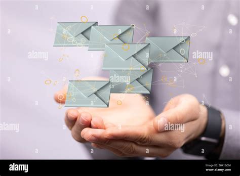 A D Rendering Of A Group Of Floating People Icons On A Businessman S Hand Stock Photo Alamy