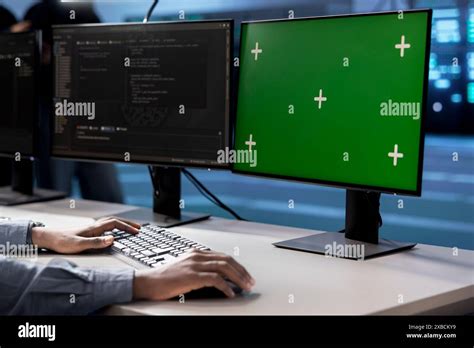 Engineer In Server Hub Using Green Screen Pc To Repair Equipment