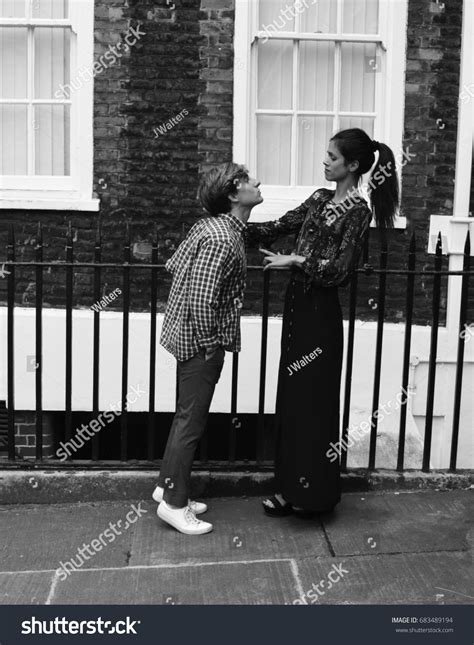 Short Guy Tall Girl Kissing