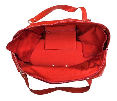 Premium Photo Top View Of Open Empty Red Travelling Bag Isolated