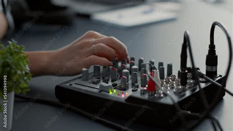 Influencer Tweaking Audio Mixer Knobs And Buttons Internet Live Talk Show Host Changing Volumes