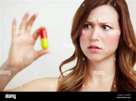 This Tablet Is Way Too Big A Worried Young Woman Looking At An