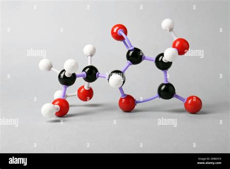 Molecule Of Vitamin C On Light Grey Background Chemical Model Stock