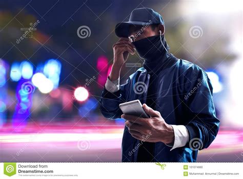 Hacker Using Mobile Phone On The Street Stock Photo Image Of Identity Crime 101074660
