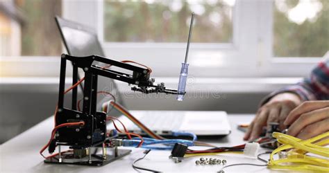 Engineering Robot Hand And Meeting With Business People Working On Ai