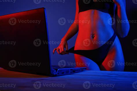 Woman In Lingerie In Front Of The Computer Webcam Stock Photo At Vecteezy