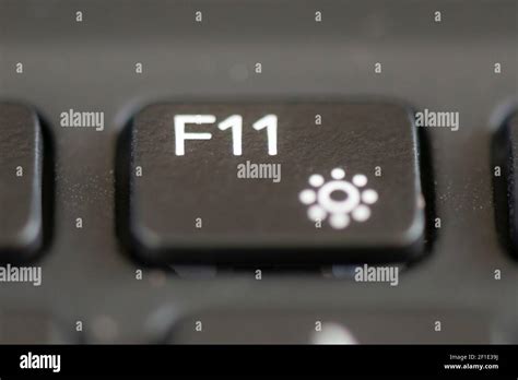 F11 And Decrease Brightness Key On A Laptop Keyboard Stock Photo Alamy