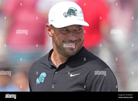 Tulane Head Coach Jon Sumrall Smiles Towards His Team Prior To The