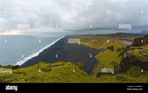 Southern Iceland Vik View On Sea Green Valley And Black Sands Beach