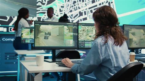 Diverse Team Of Employees Monitoring Delivery Trucks Routes Around The City Stock Video Video