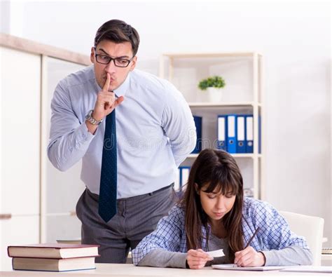Male Lecturer Giving Lecture To Female Babe Stock Photo Image Of Examination Revising