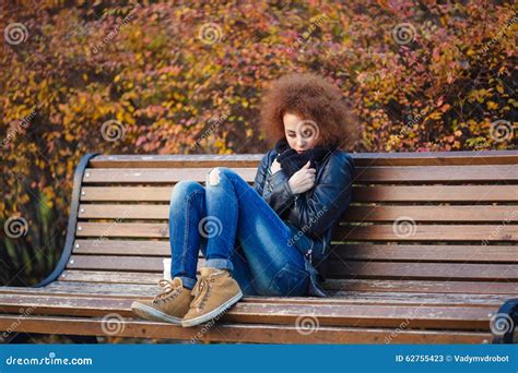 Sad Woman Sitting On The Bench In Autumn Park Stock Image Image Of