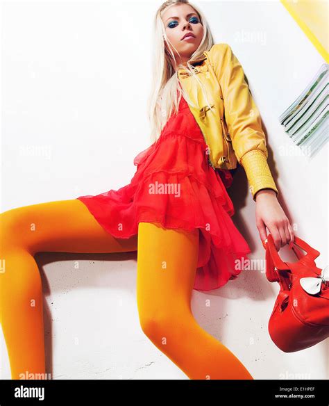 Fashion Style Beautiful Sexy Blonde Flirting Female In Colorful Dress
