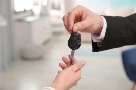 Man Giving Car Key To Woman Indoors Closeup Stock Image Image Of Customer Automobile