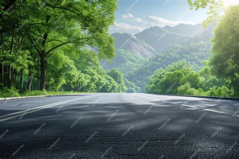 Premium Photo Asphalt Road And Green Forest With Mountain Nature