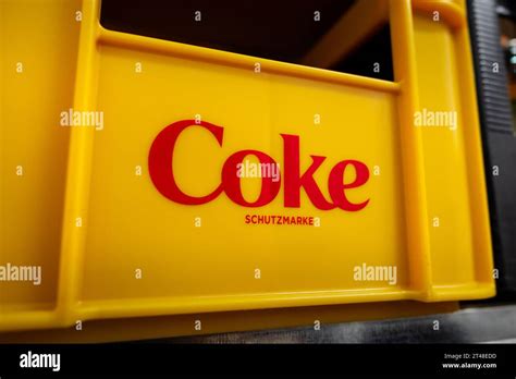 Coke Logo Sign Of The Coca Cola Company On A Yellow Crate The Brand Of