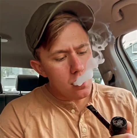 Smoking Handsome Young Pipe Smoker