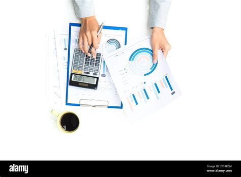 Top View Of Woman Hands Calculating And Working With Financial Graph