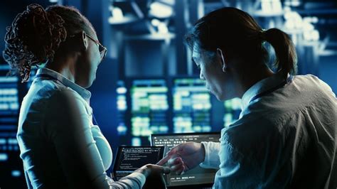 Premium Photo Colleagues Programming In Server Farm Housing Advanced Infrastructure Storing