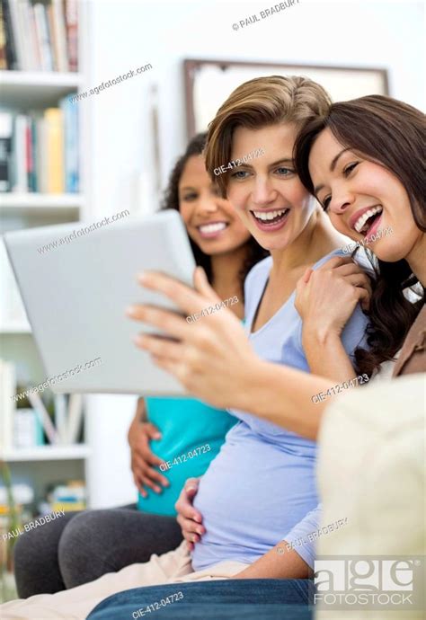 Women Using Tablet Computer Together Stock Photo Picture And Royalty Free Image Pic CIE