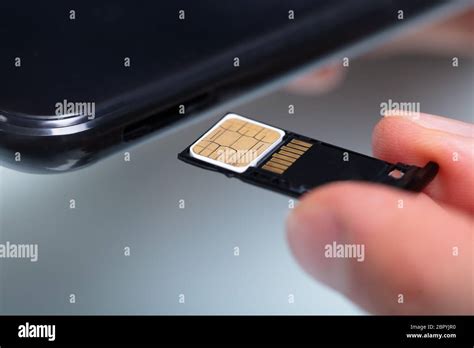 Inserting A Sim Card Hi Res Stock Photography And Images Alamy