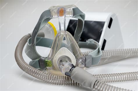 Premium Photo Continuous Positive Airway Pressure System Includes Of Cpap Machine Mask Tube On