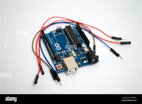 Arduino Wires And Around Transistors Lined Up On A White Background