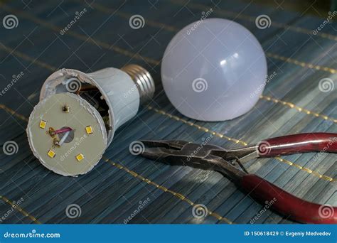 Disassembled Led Household Lamp With A Burnt Led Element Is On The Table Stock Image Image Of