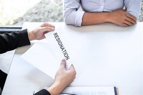 Premium Photo Low Section Of Man With Text On Table