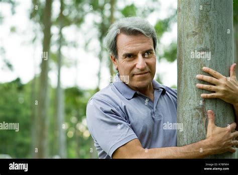 Man Hugging Tree Hi Res Stock Photography And Images Alamy