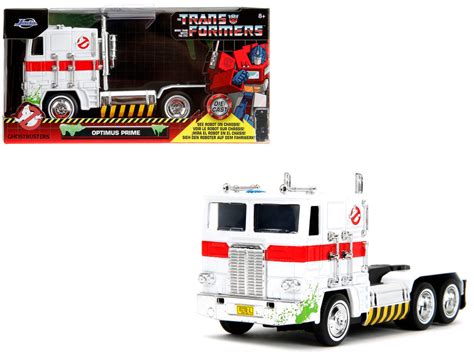 Transformer G1 Optimus Prime In Ghostbusters Ecto 1 Graphic Deco · Distribution Diecast64
