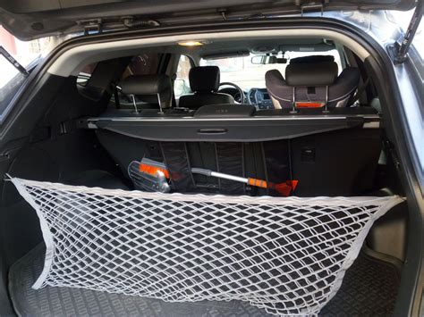 Кармашки на липучках и сетка в багажник — Hyundai Santa Fe (3G), 2,4 л ...